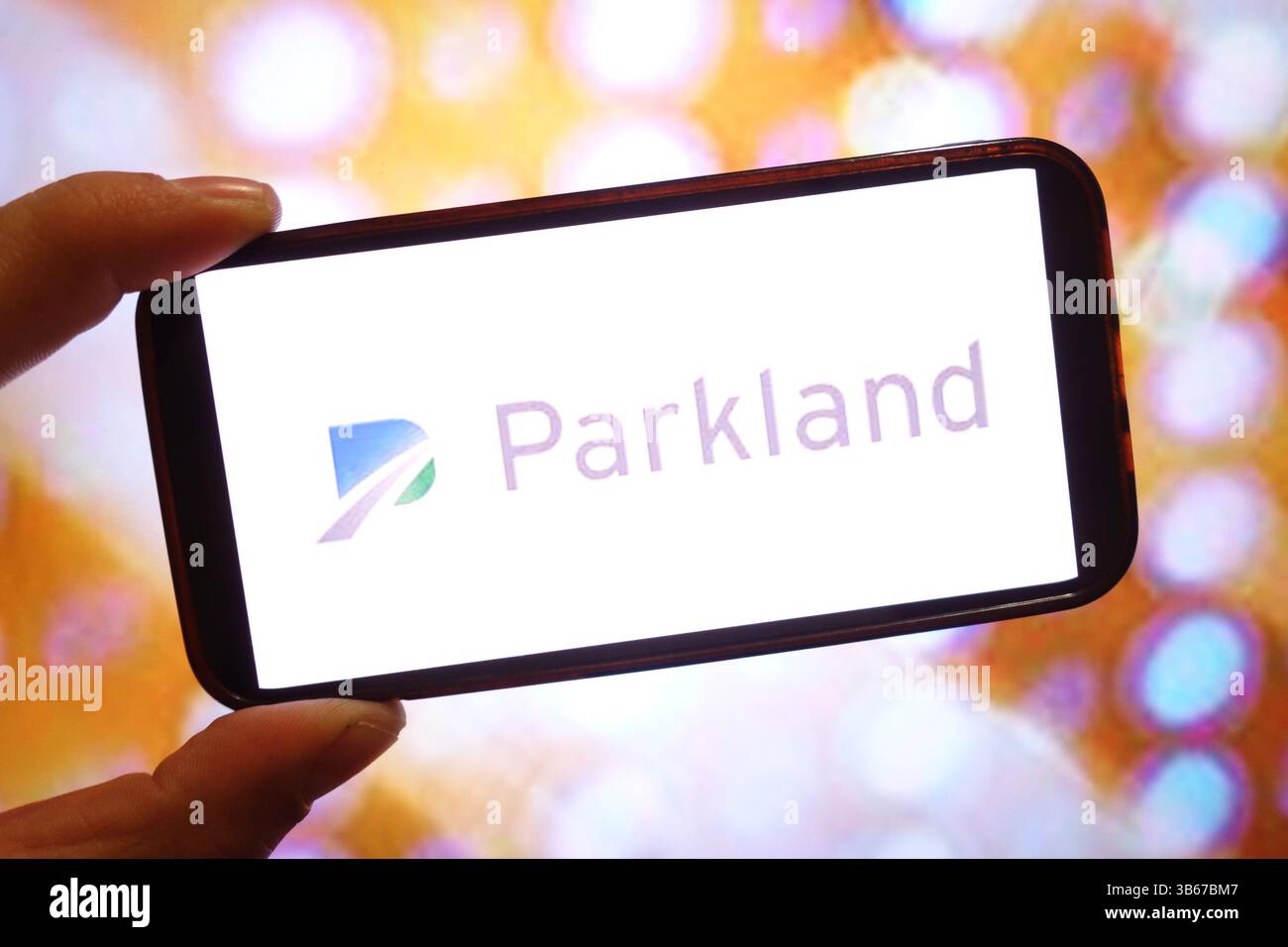 In this photo illustration, the Parkland Corp company logo is seen ...