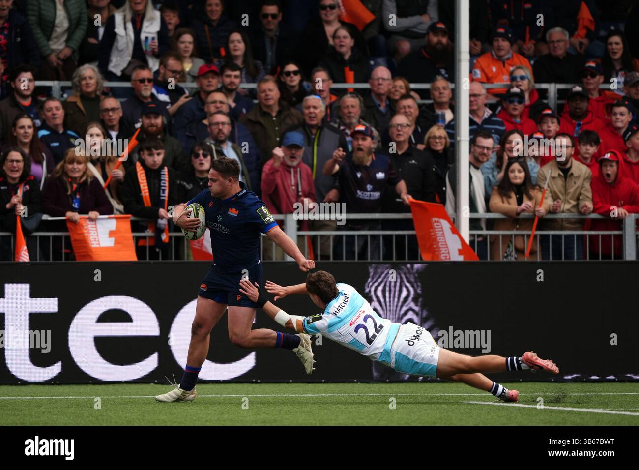 Edinburgh Rugby’s Patrick Harrison scores a try during the EPCR ...