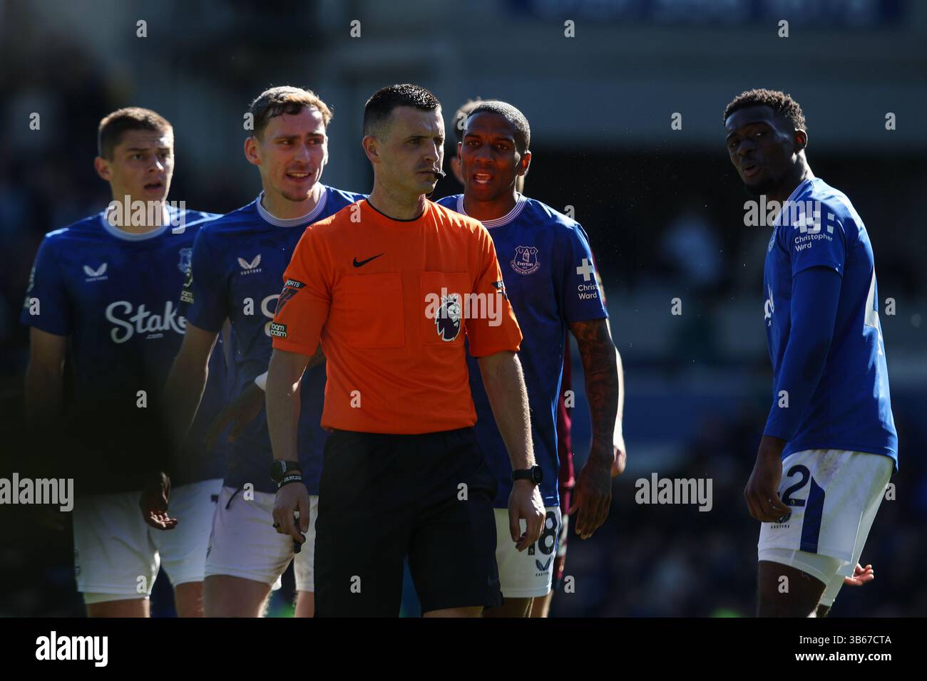 LIVERPOOL, UK - 3rd May 2025: Everton players surround Referee Lewis ...