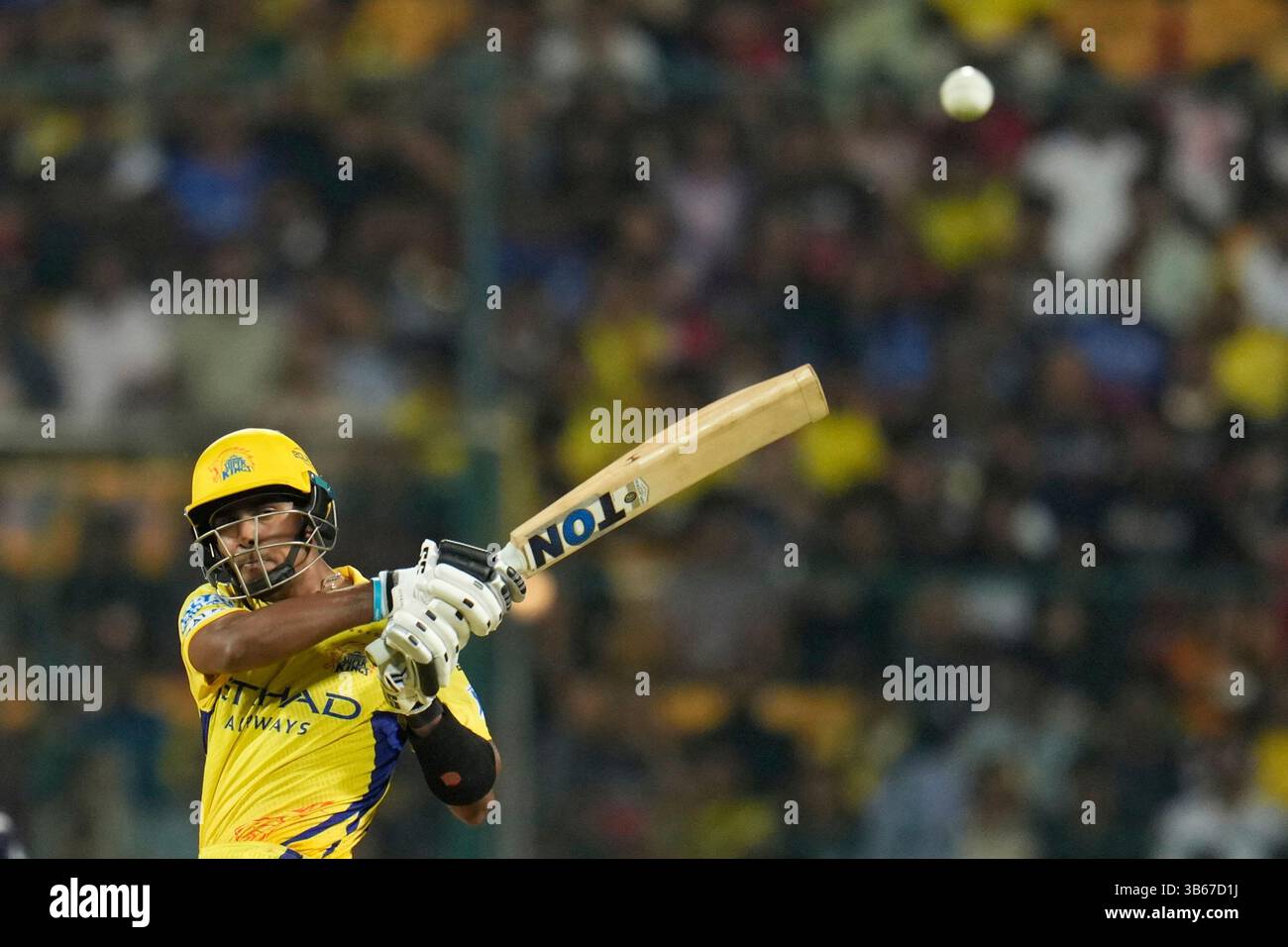 Chennai Super Kings' Shaik Rasheed hits a boundary during the Indian ...