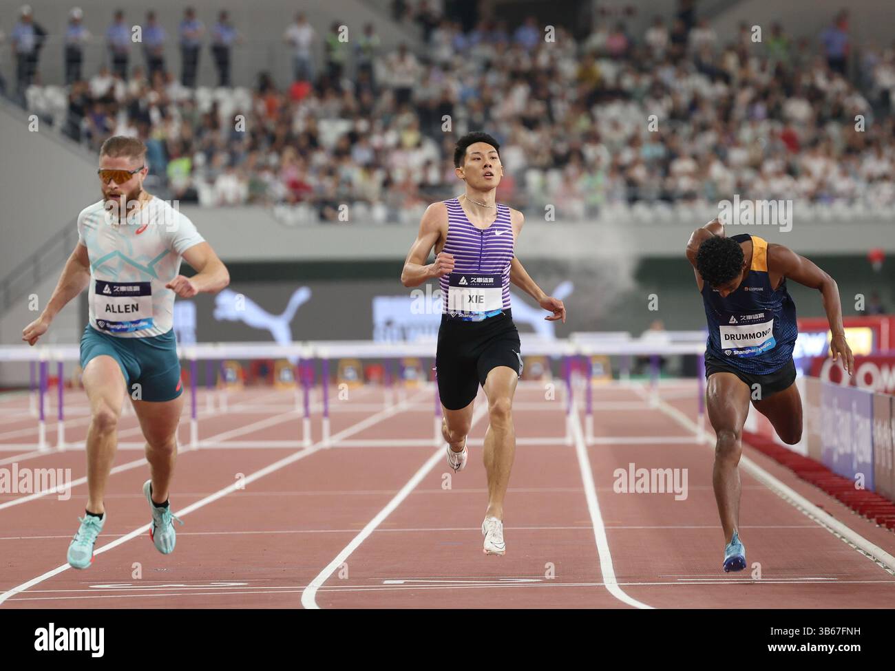 Shaoxing. 3rd May, 2025. Xie Zhiyu (C) of China reacts after the Men's ...