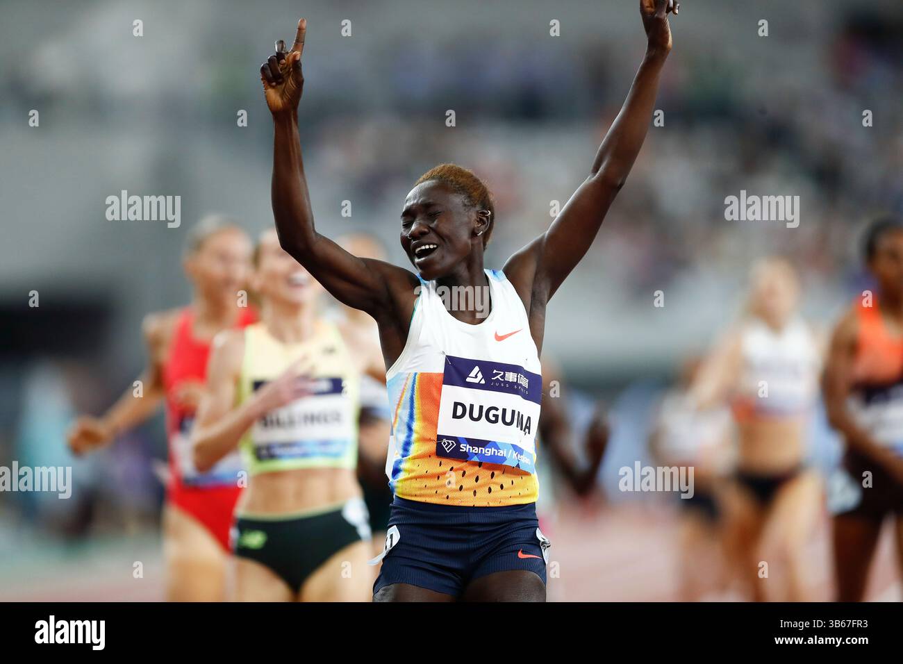 Shaoxing. 3rd May, 2025. Tsige Duguma (front) of Ethiopia celebrates ...