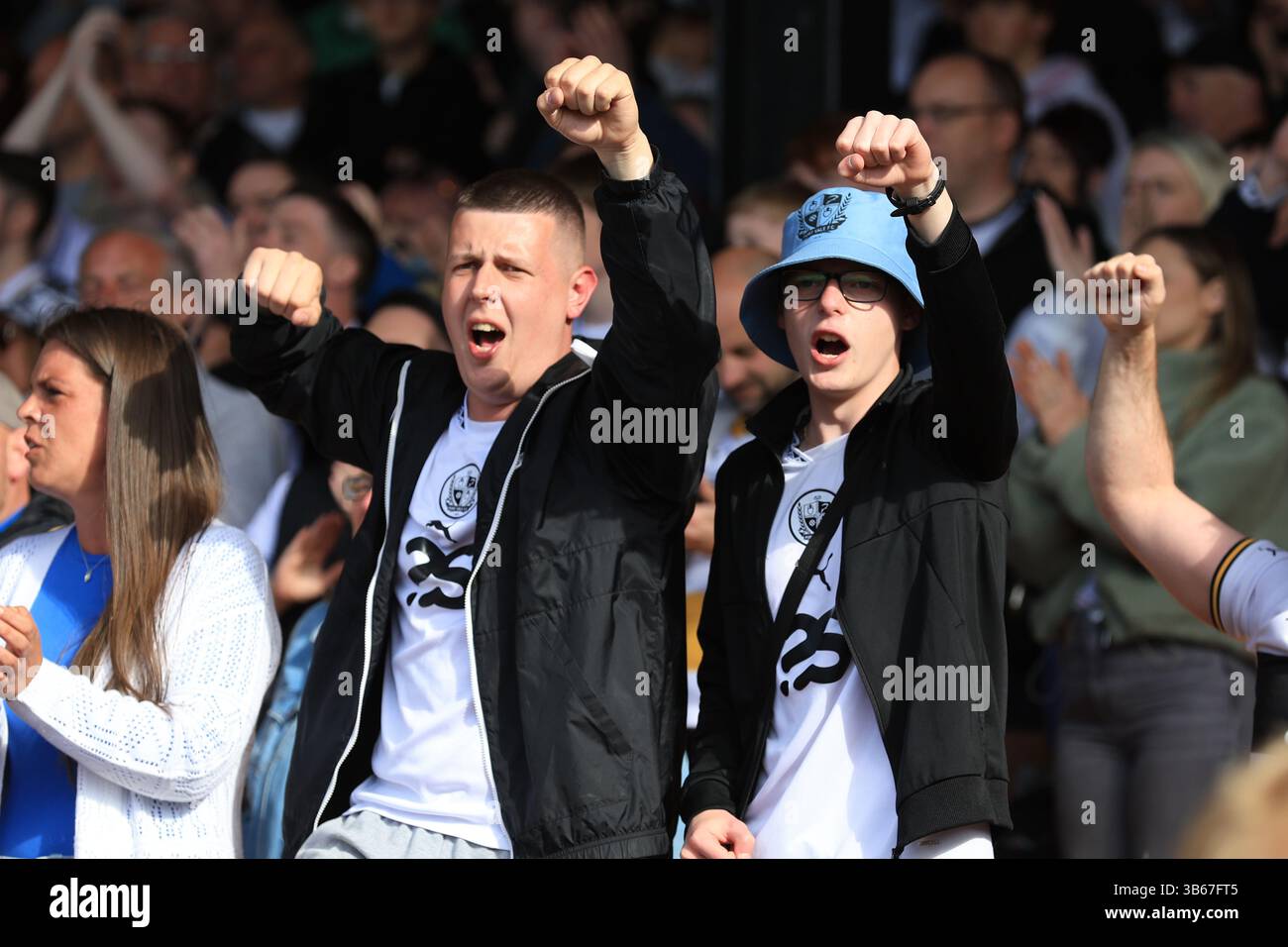 Port Vale fans celebrate promotion after the final whistle of the Sky ...