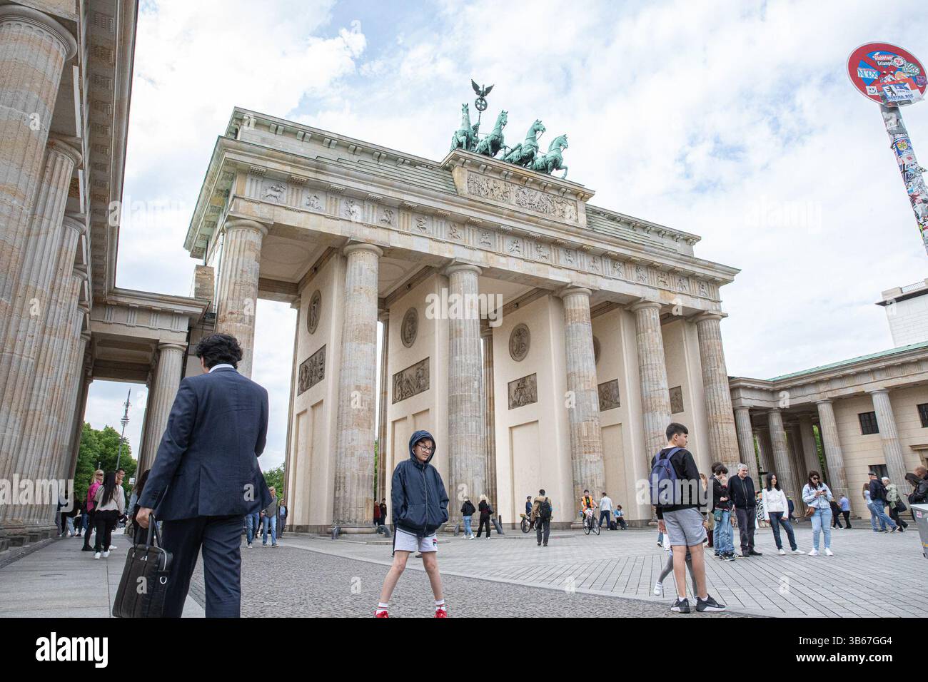 With the Brandenburg Gate as a solemn backdrop, Berlin, on Saturday ...