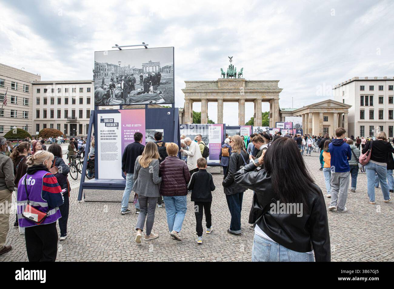 With the Brandenburg Gate as a solemn backdrop, Berlin, on Saturday ...