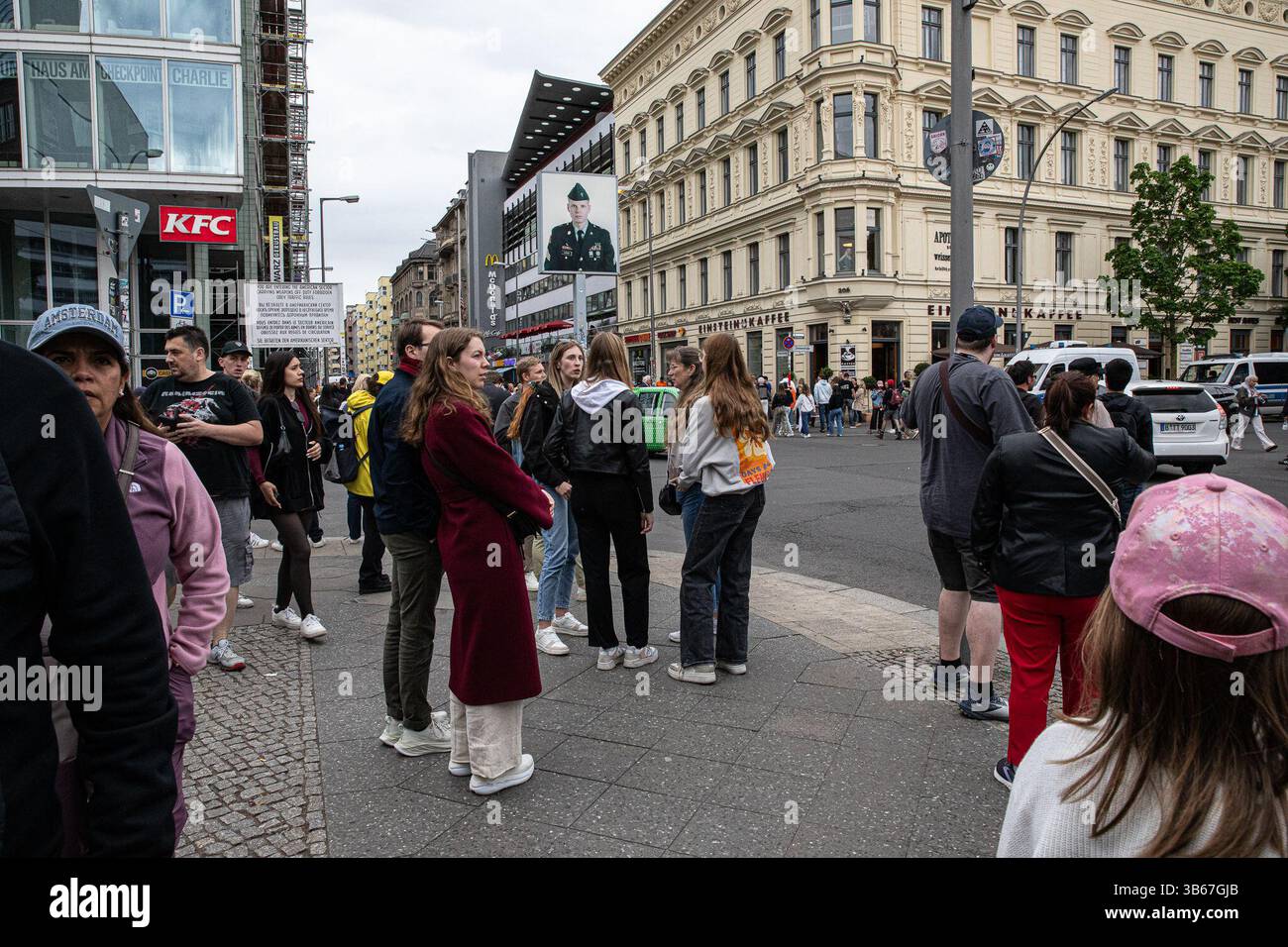 With the Brandenburg Gate as a solemn backdrop, Berlin, on Saturday ...