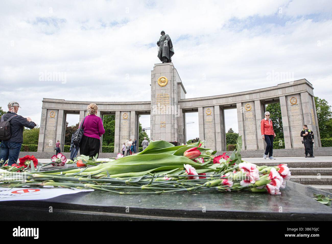With the Brandenburg Gate as a solemn backdrop, Berlin, on Saturday ...