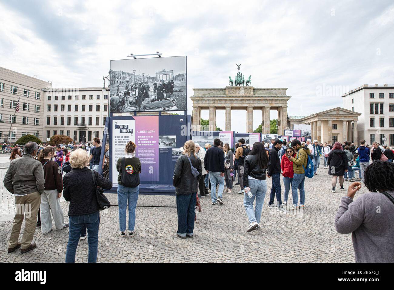 With the Brandenburg Gate as a solemn backdrop, Berlin, on Saturday ...