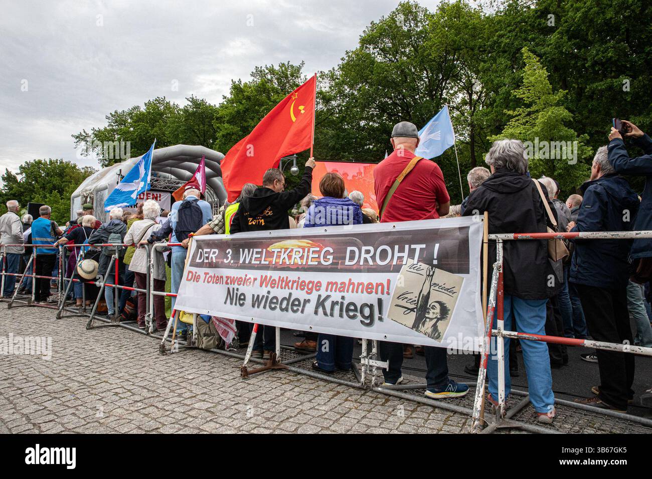 With the Brandenburg Gate as a solemn backdrop, Berlin, on Saturday ...