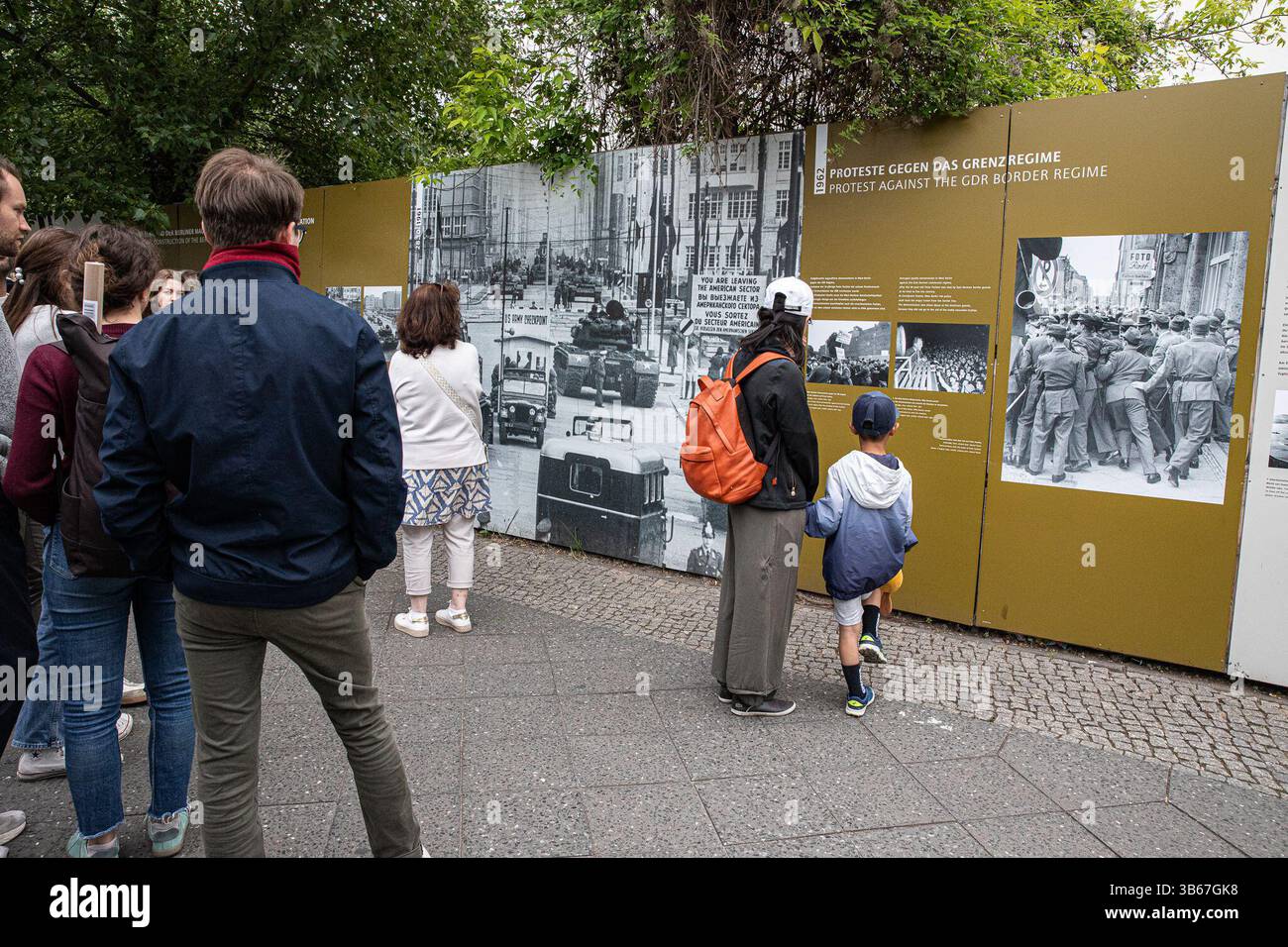 With the Brandenburg Gate as a solemn backdrop, Berlin, on Saturday ...