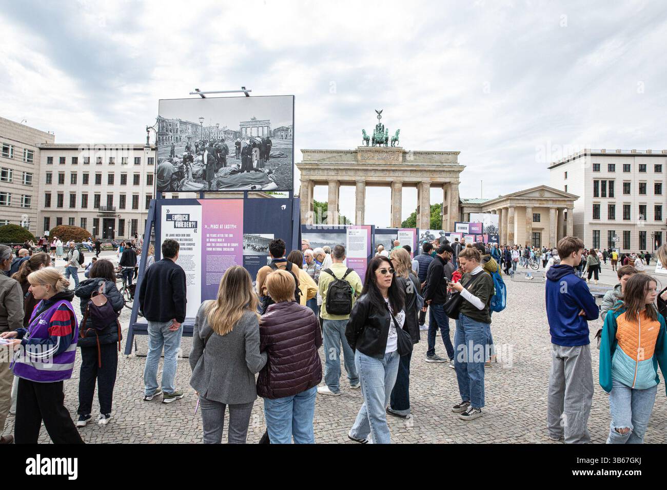 With the Brandenburg Gate as a solemn backdrop, Berlin, on Saturday ...
