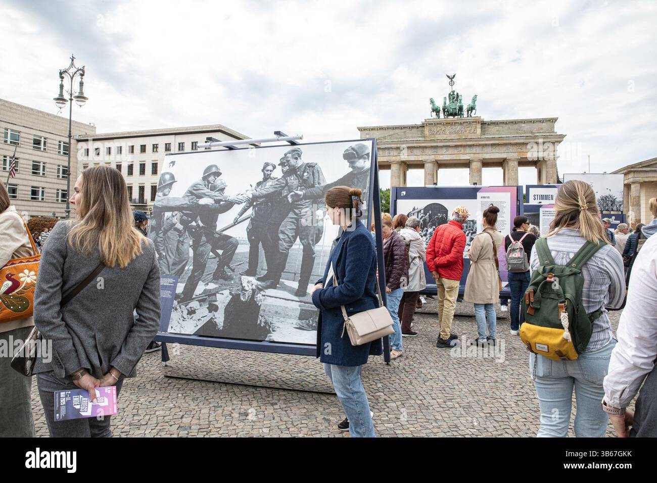 With the Brandenburg Gate as a solemn backdrop, Berlin, on Saturday ...