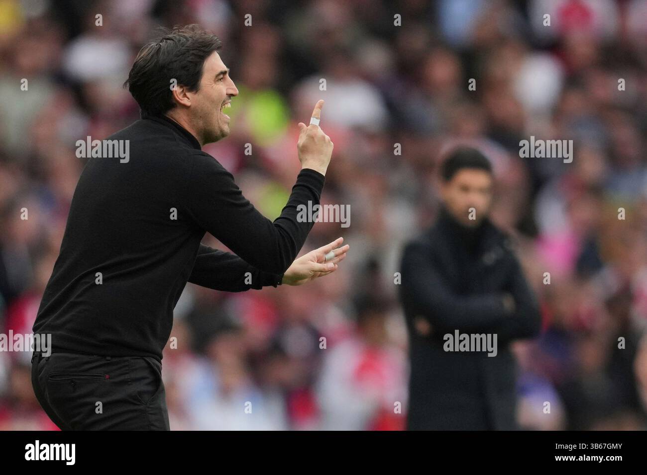 Bournemouth's head coach Andoni Iraola gives instructions to his ...