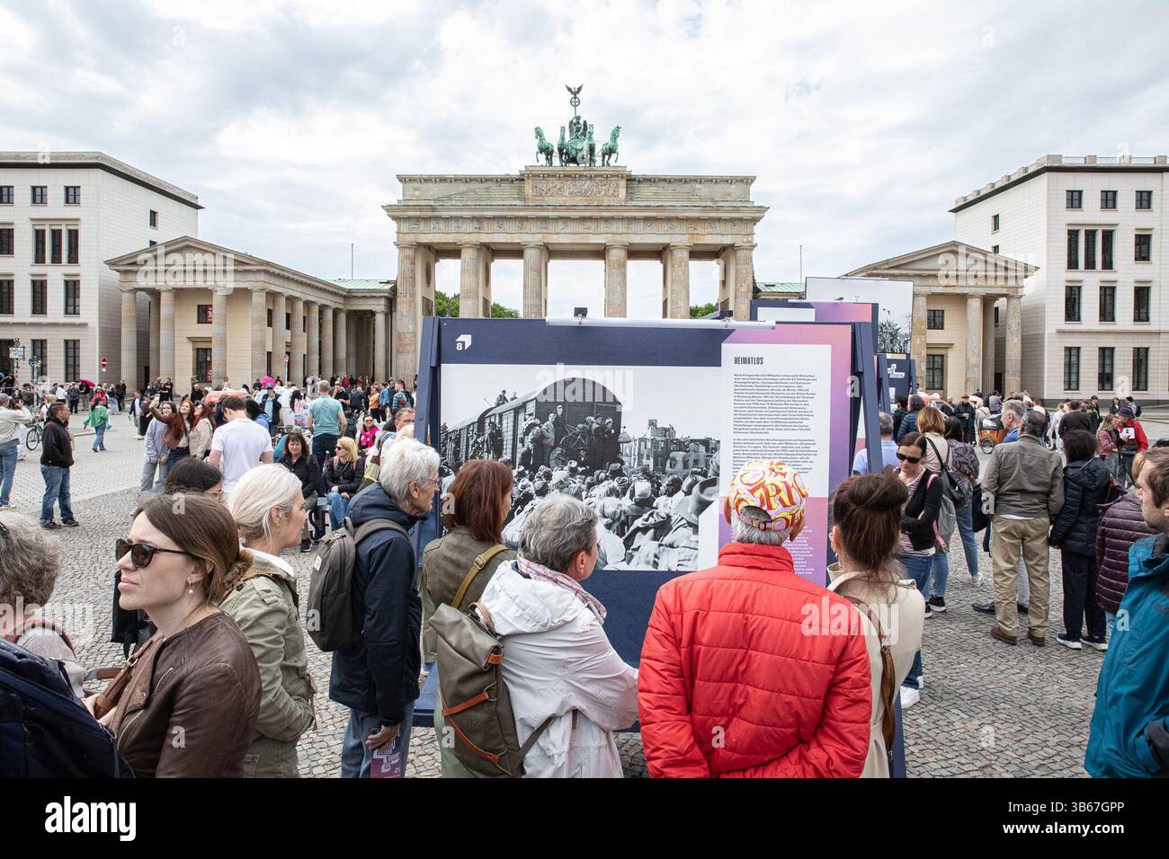 With the Brandenburg Gate as a solemn backdrop, Berlin, on Saturday ...