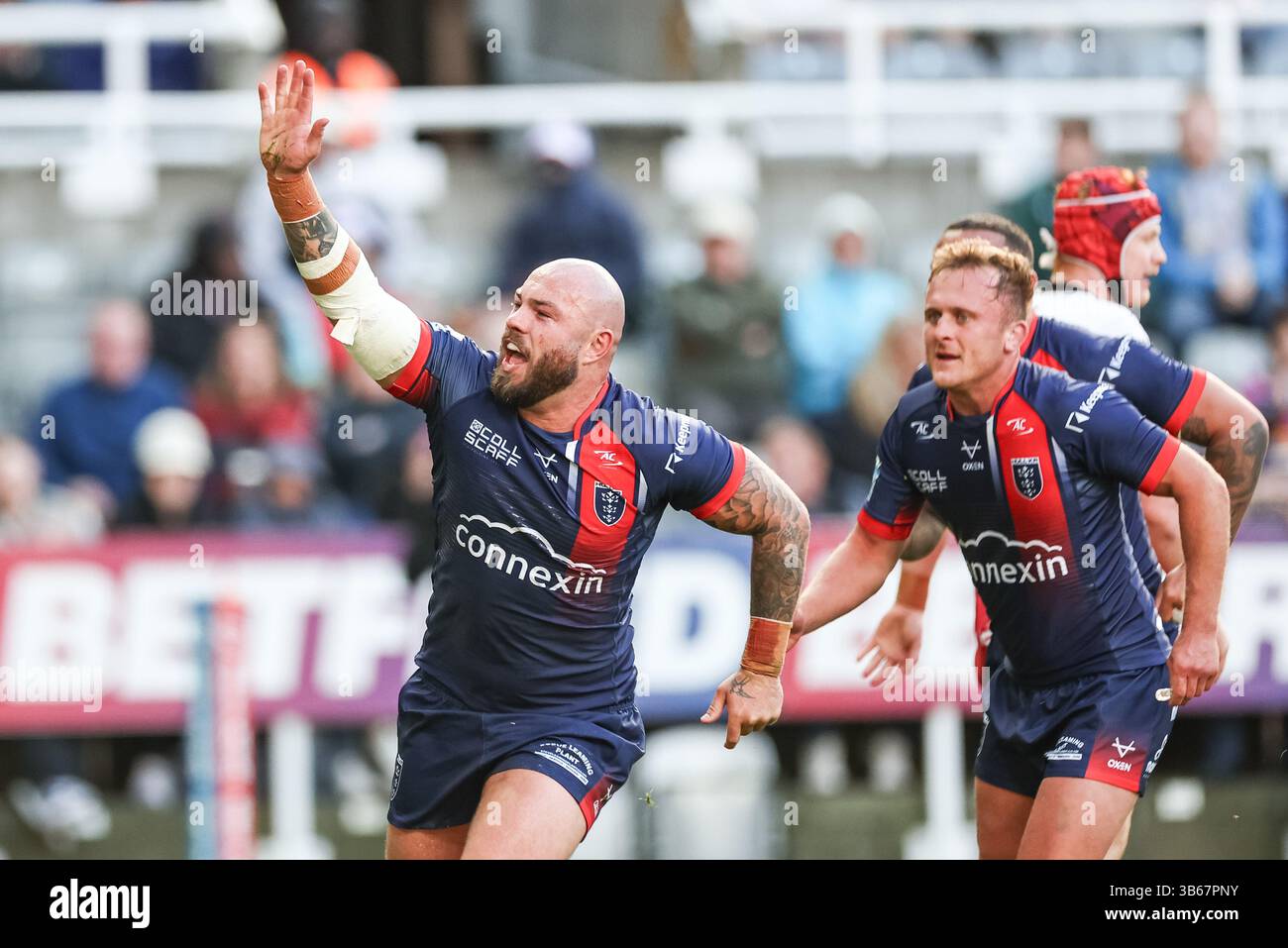Sam Luckley of Hull KR celebrates his try during the Betfred Magic ...