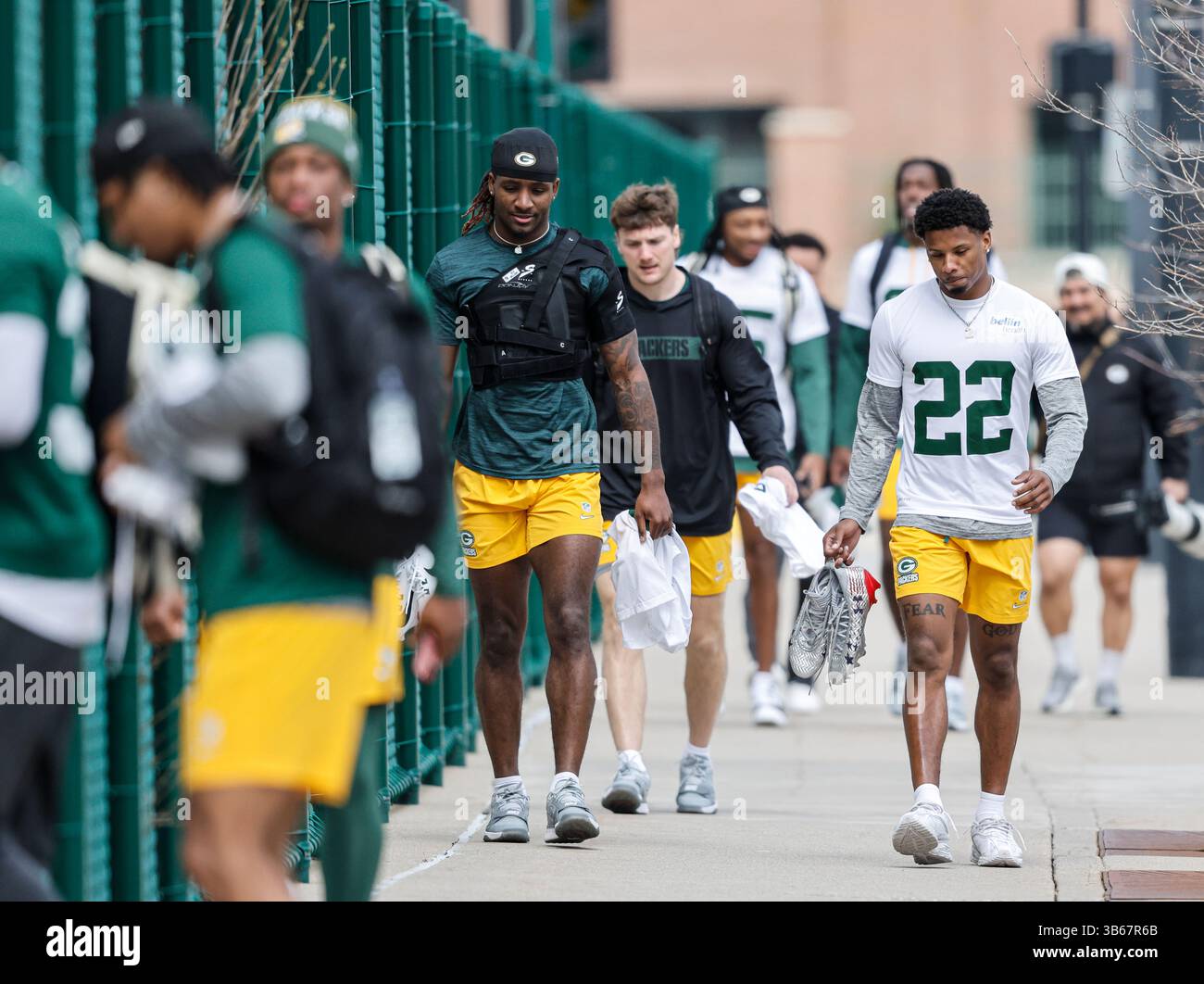 Green Bay Packers' Matthew Golden (22) walks to practice during the NFL ...