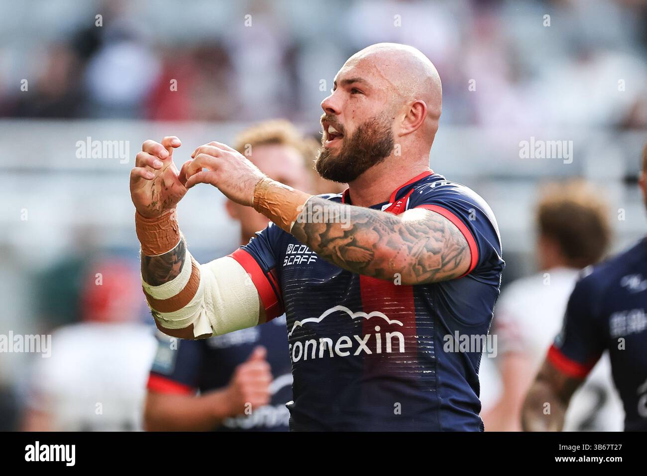Sam Luckley of Hull KR celebrates his try during the Betfred Magic ...