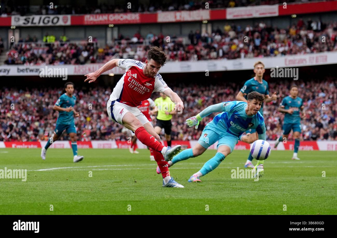 Arsenal's Declan Rice scores their side's first goal of the game during ...