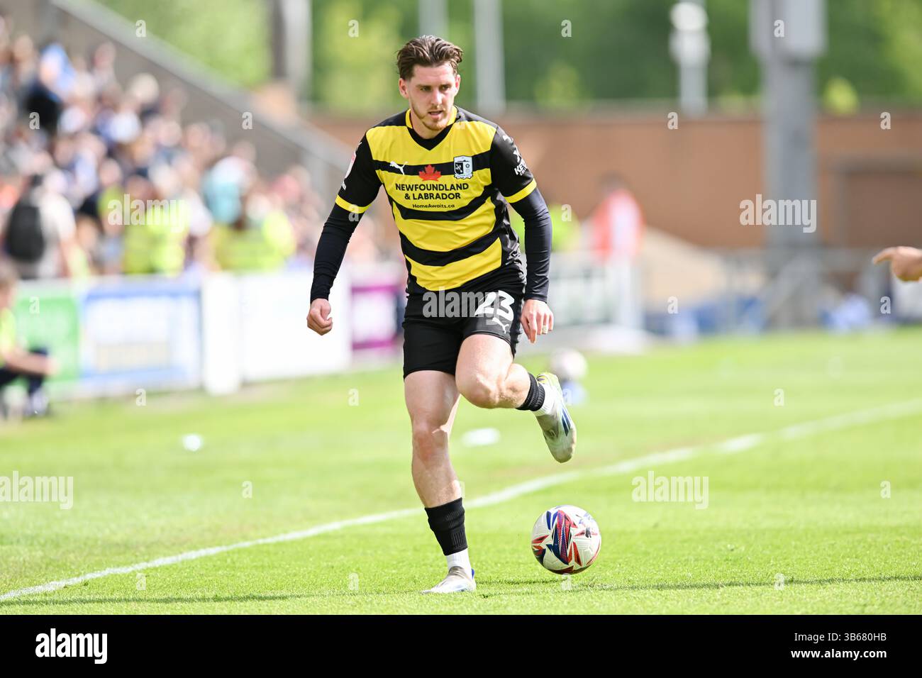 Connor Mahoney (23 Barrow) goes forward during the Sky Bet League 2 ...