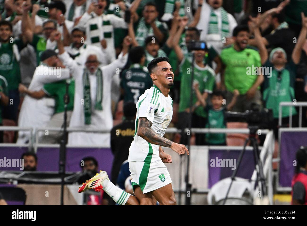 Al Ahli's Wenderson Galeno celebrates after scoring his side's opening ...
