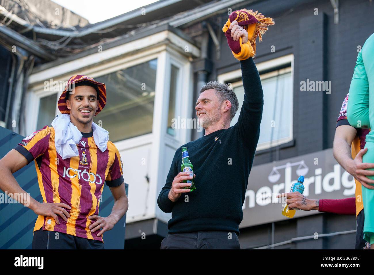 Bradford City manager Graham Alexander celebrates promotion after ...