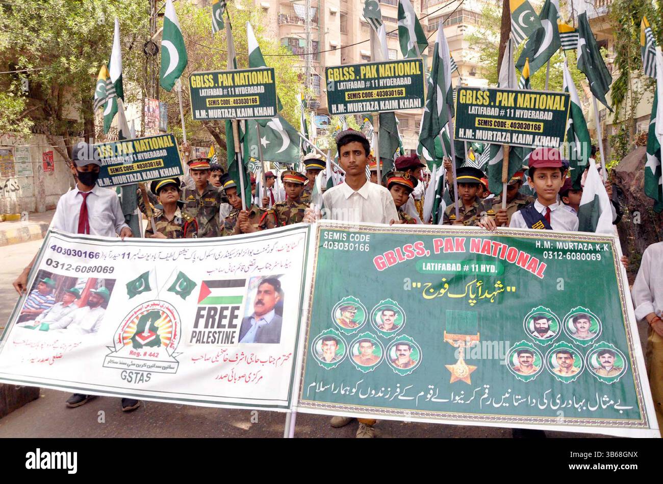 Members of District Boys Scout Association Sindh are holding Difa-e ...