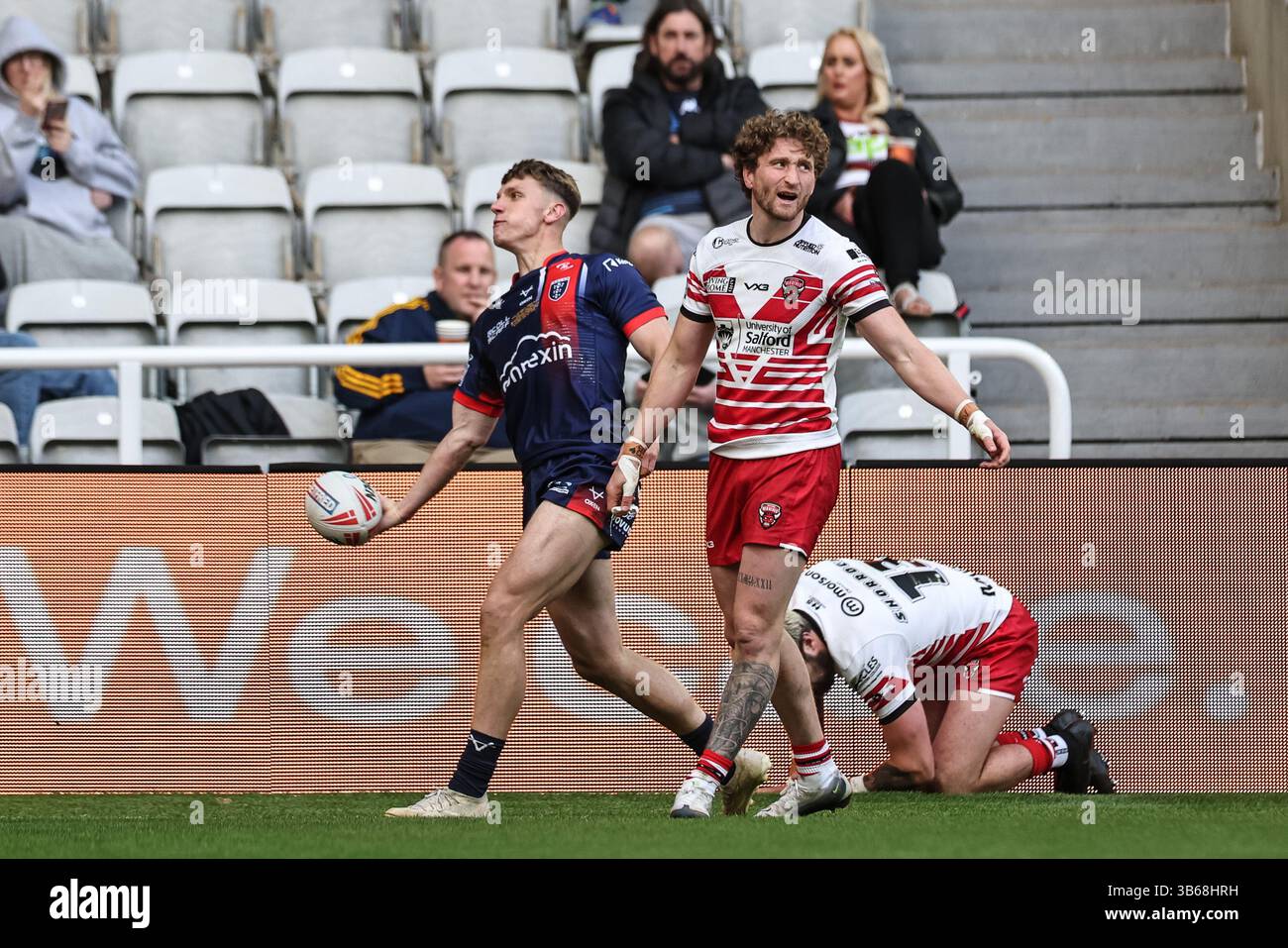 Noah Booth of Hull KR celebrates his try during the Betfred Magic ...