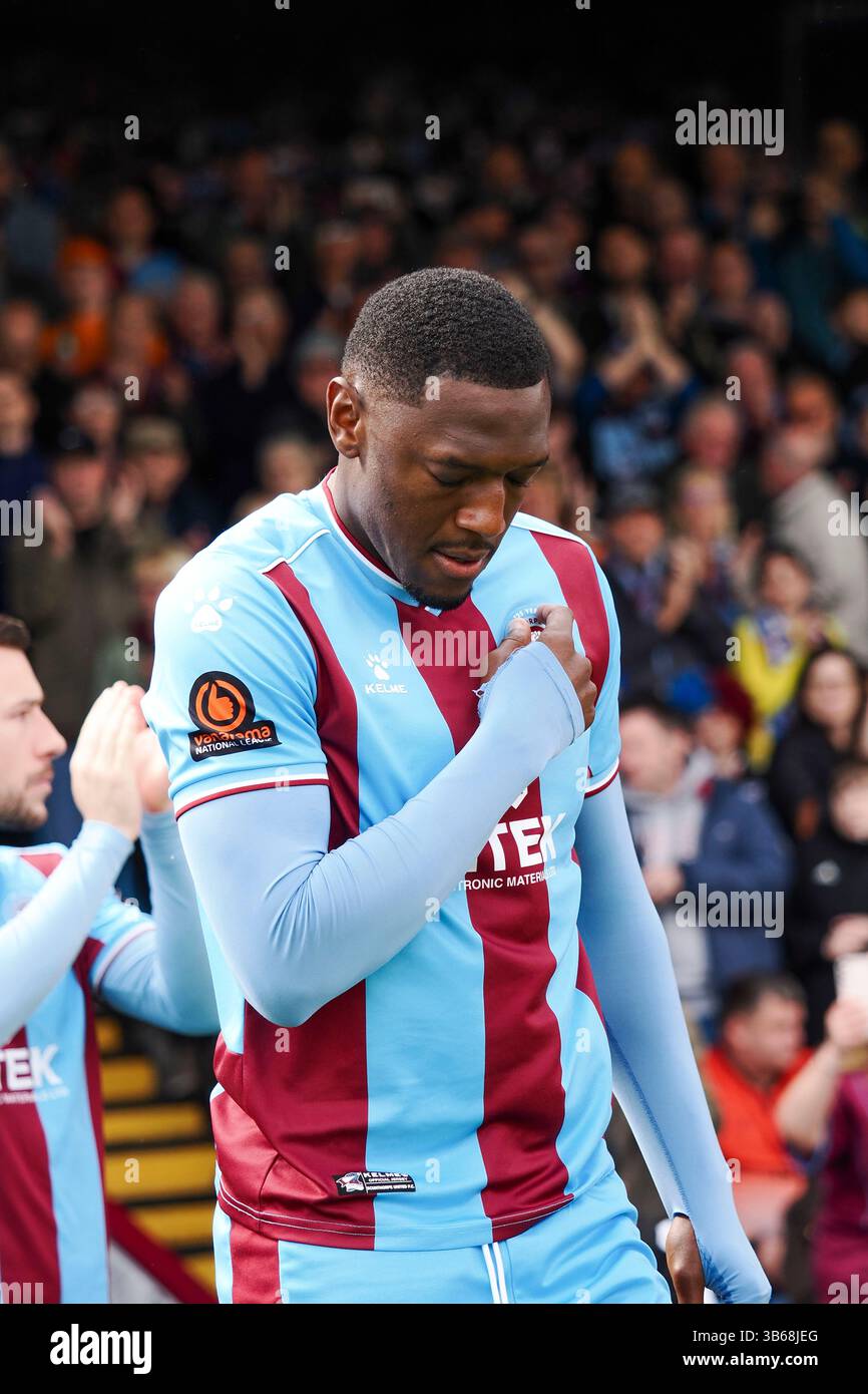 Scunthorpe , United Kingdom . 3 May, 2025. Pictured left to right, Carlton Ubaezuonu making ...