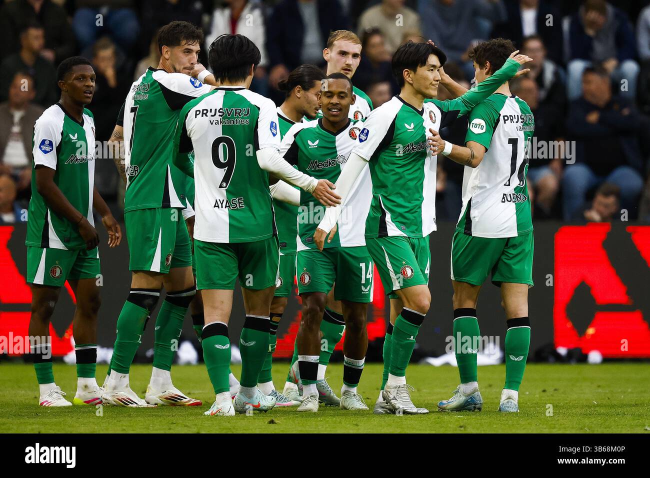 ALMELO - In-beom Hwang of Feyenoord (r) receives congratulations after ...