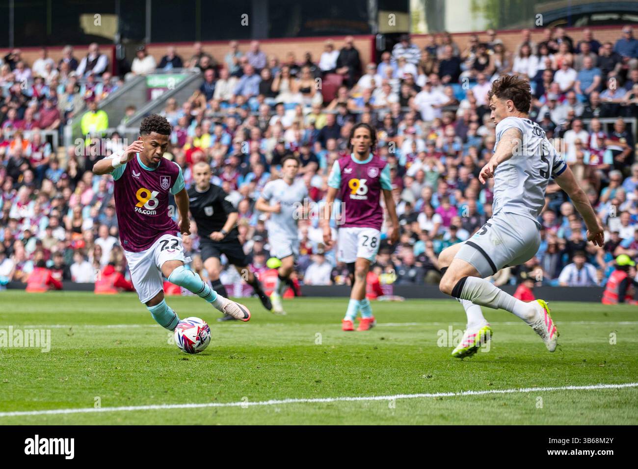 Marcus Edwards #22 of Burnley FC tackled by Jake Cooper #5 of Millwall ...