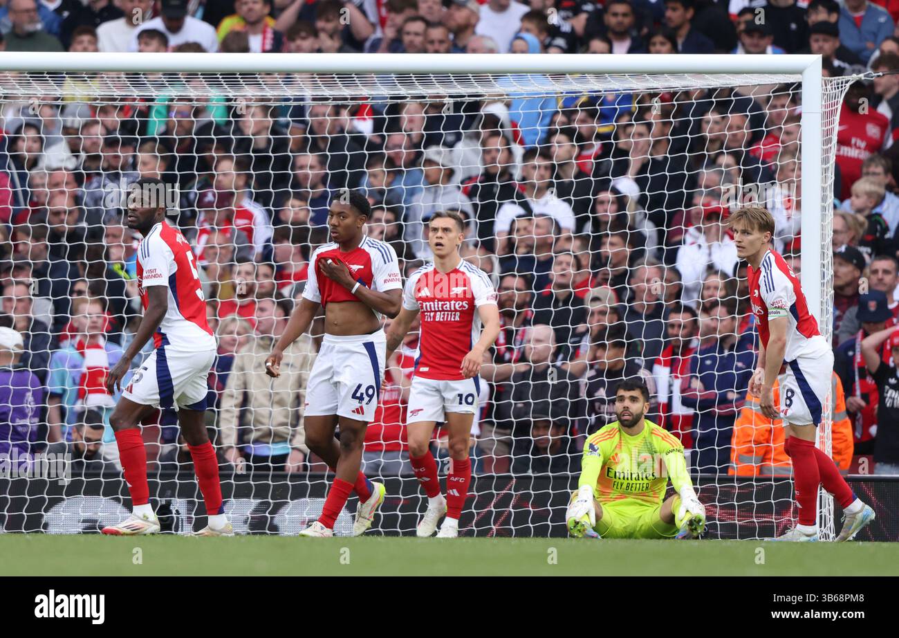 London, UK. 03rd May, 2025. David Raya (A) and Arsenal dejection after the second Bournemouth ...