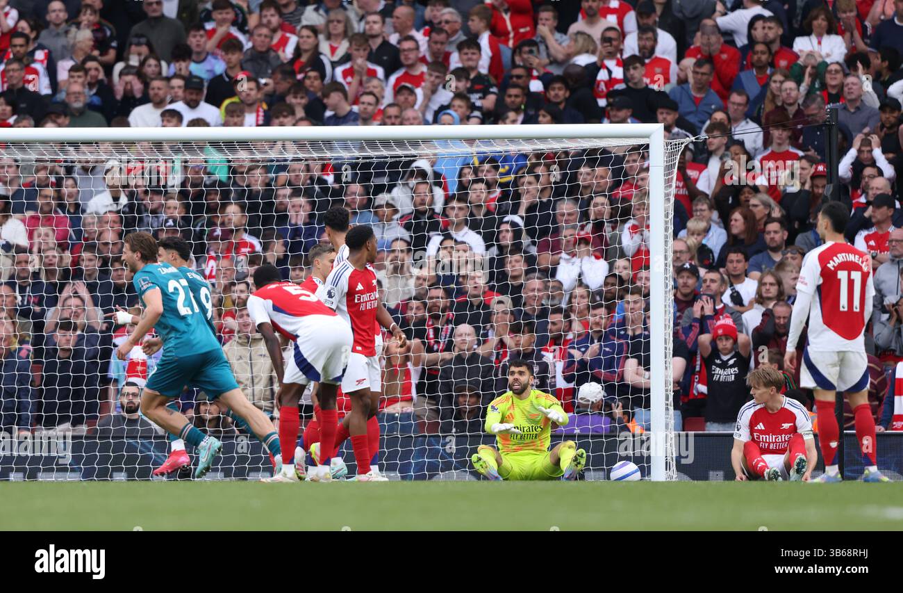 London, UK. 03rd May, 2025. David Raya (A) and Arsenal dejection after the second Bournemouth ...