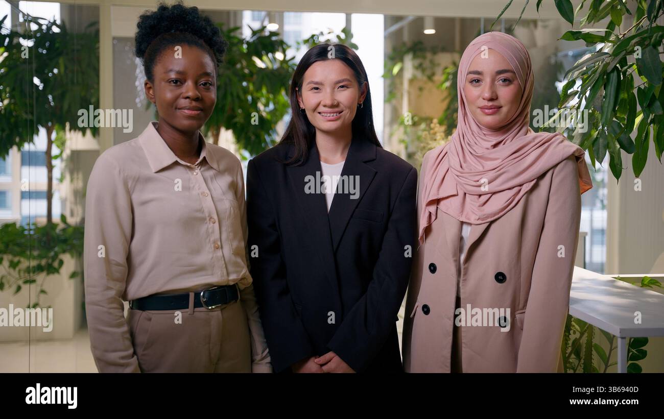 Three beautiful multiracial girls ethnic diversity business women ...