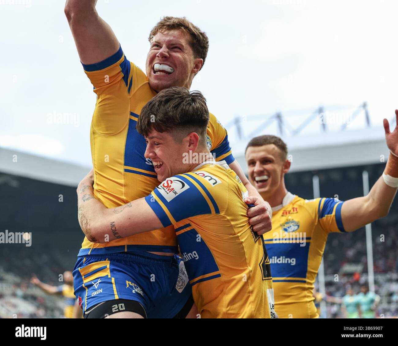 Riley Lumb of Leeds Rhinos celebrates his try during the Betfred Magic ...