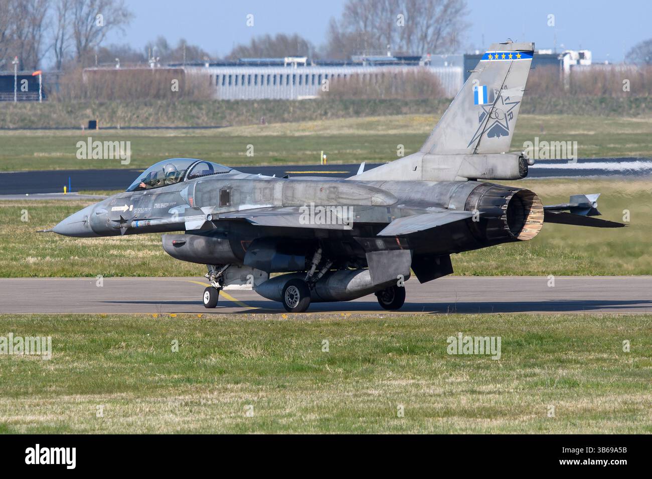 A F-16C of the Hellenic Air Force awaits clearance to taxi onto the ...