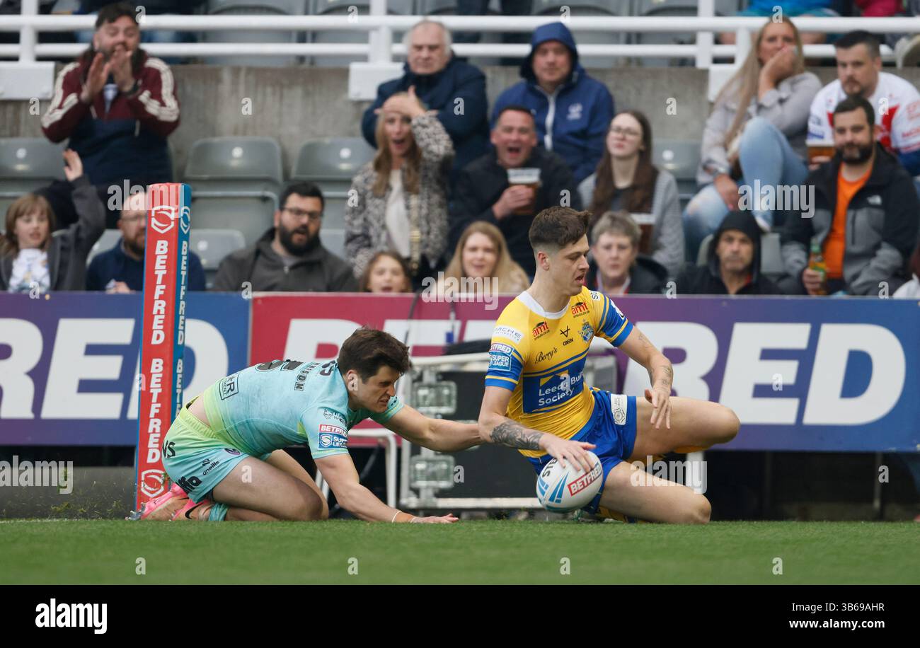 Leeds' Riley Lumb scores their first try of the game during the Betfred ...