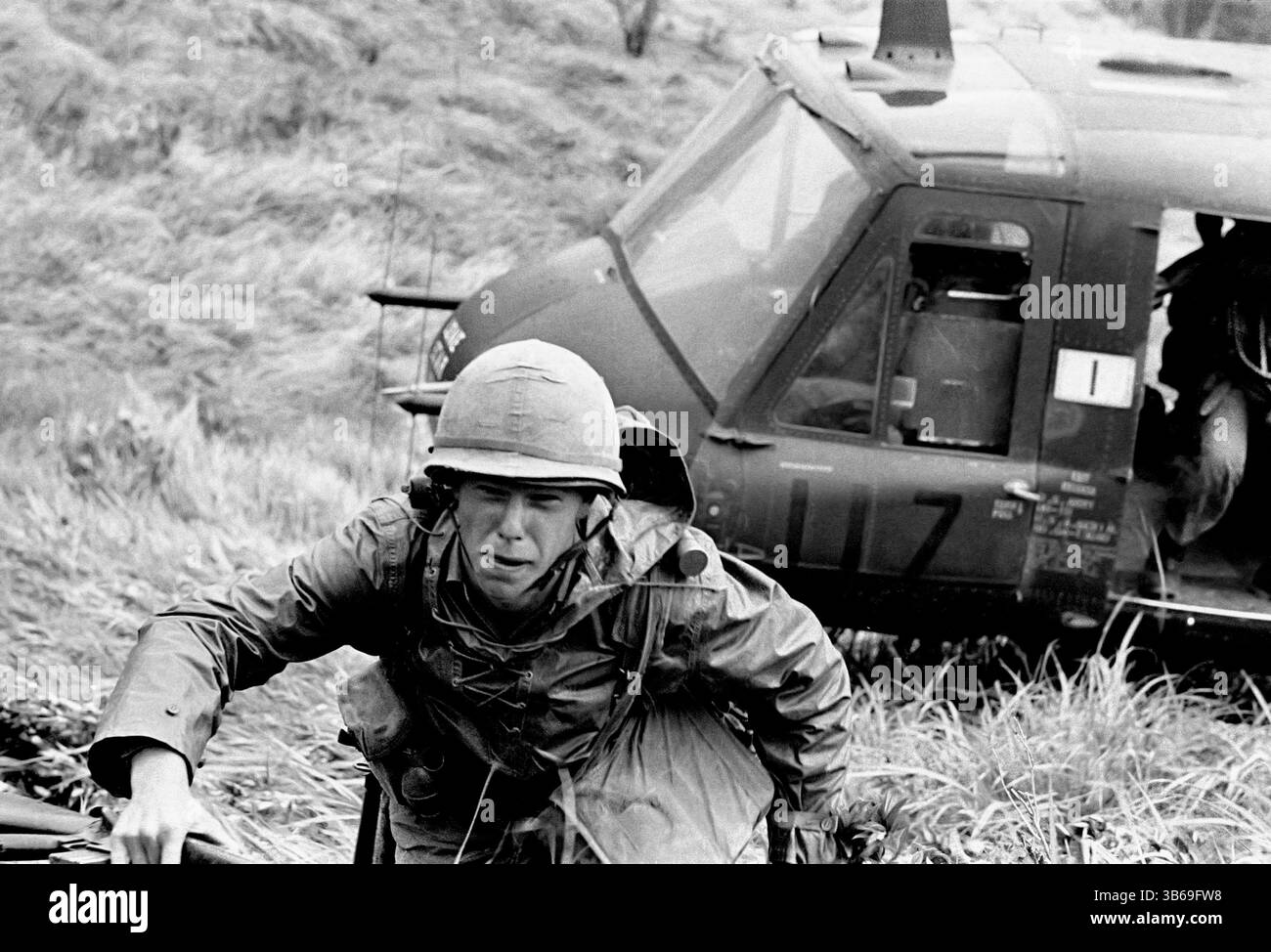 Troops make an air assault from a UH-1 Huey into the central highlands ...