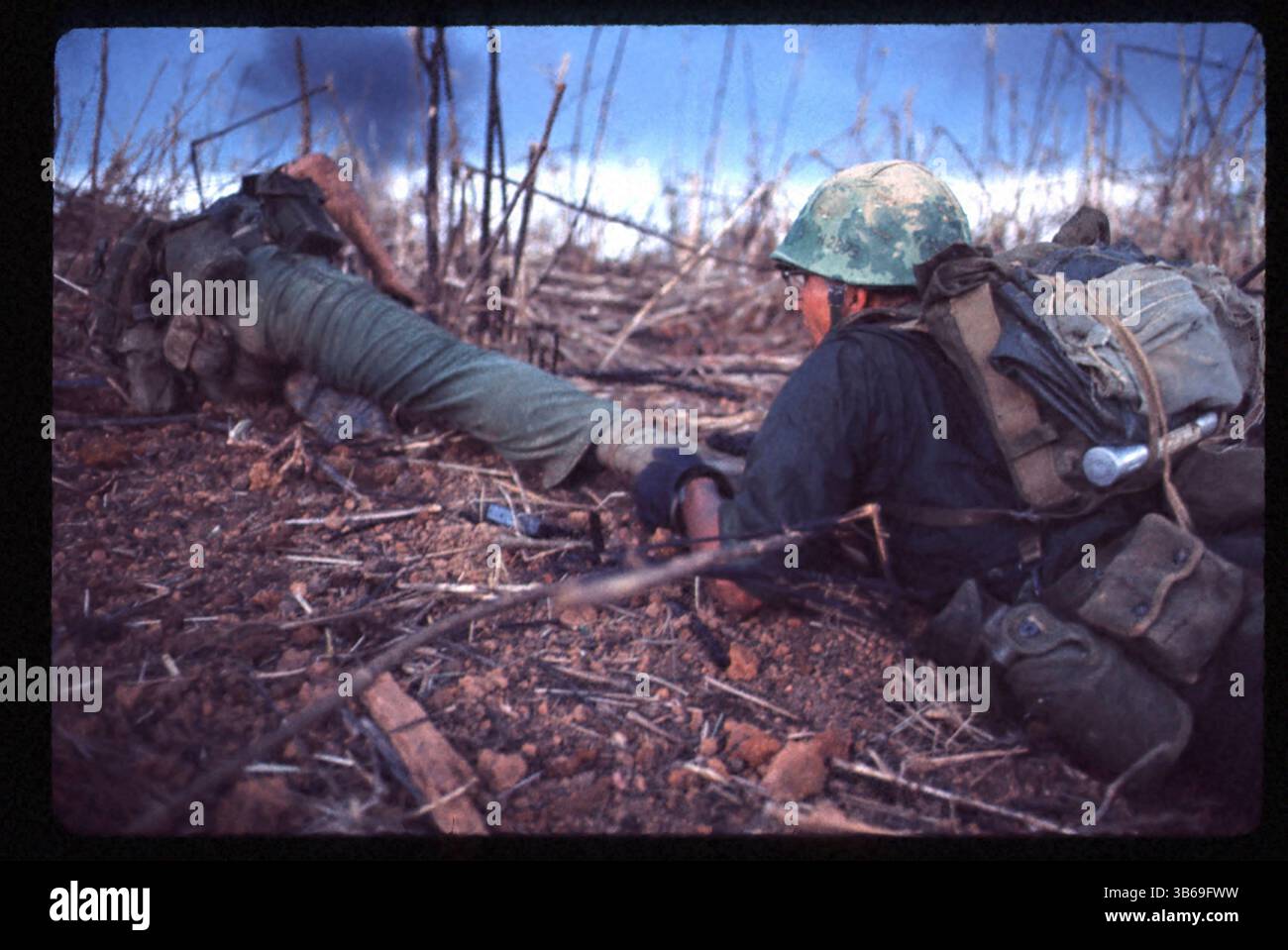 A Marine drags a mortally wounded comrade from Hill 88 N during the ...