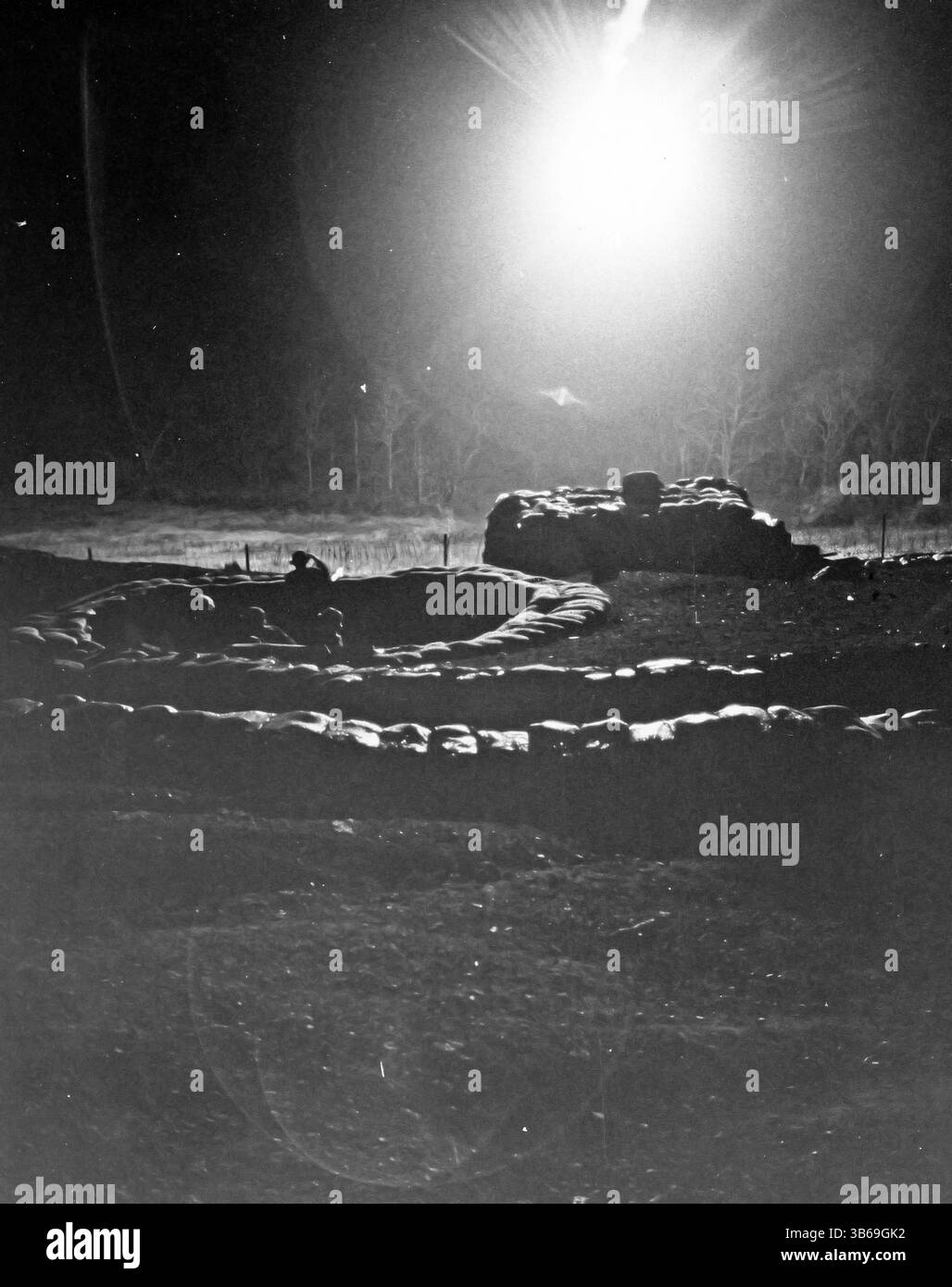 A flare lights up the besieged Ben Het Special Forces camp in South ...