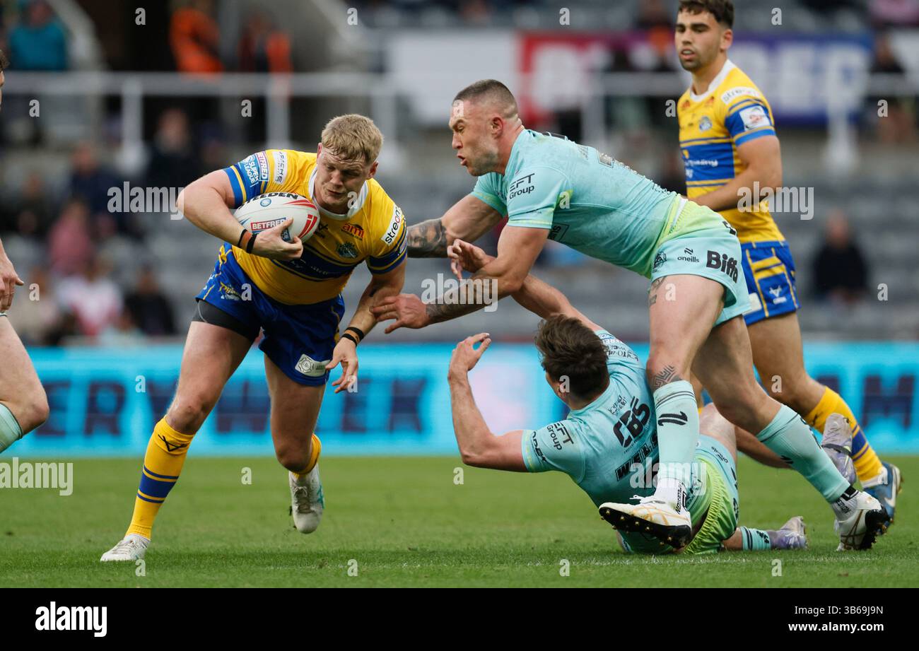 Leeds' James McDonnell is tackled during the Betfred Super League match ...