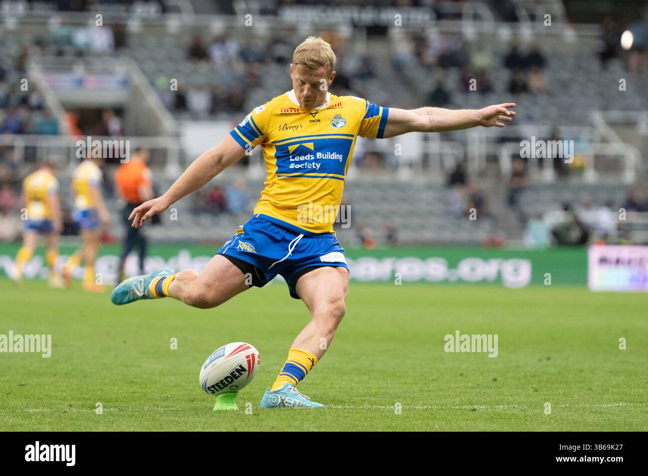 Leeds Rhinos Lachie Miller kicks the ball and converts during the ...