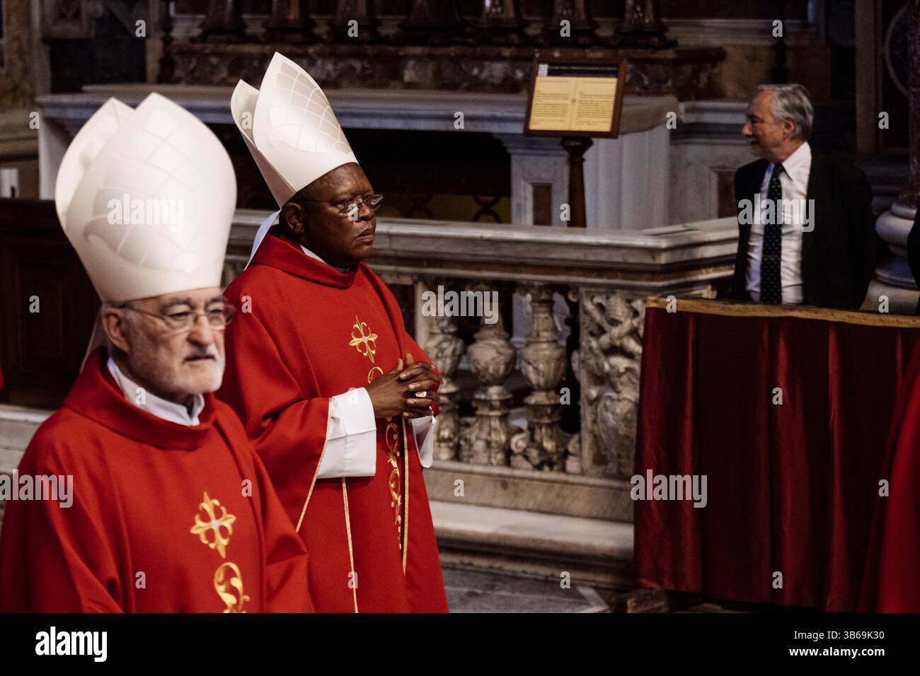 Cardinal Cristobal Lopez Romero (L) seen entering in the room ...