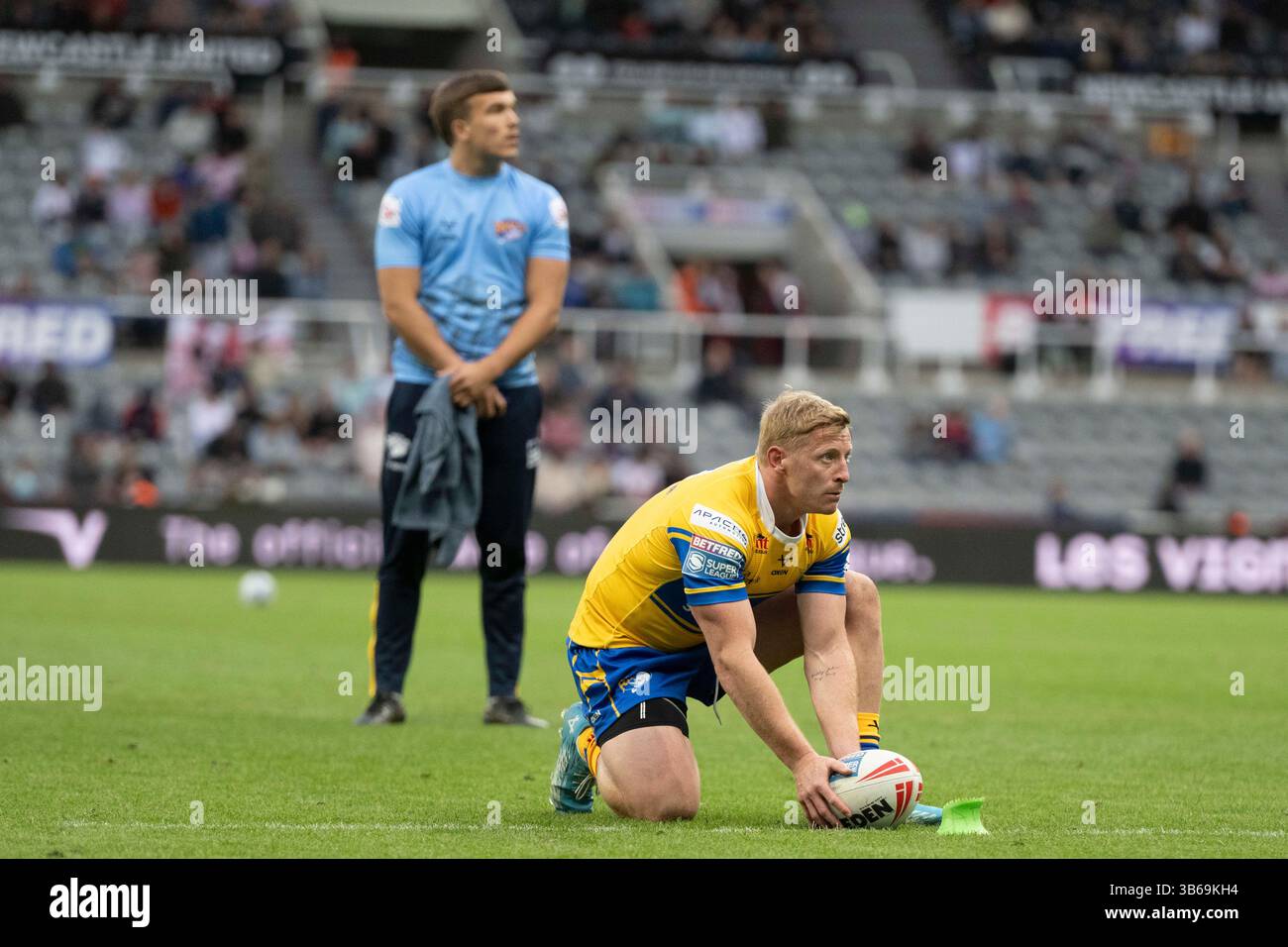 Leeds Rhinos Lachie Miller places the ball ready to convert during the ...