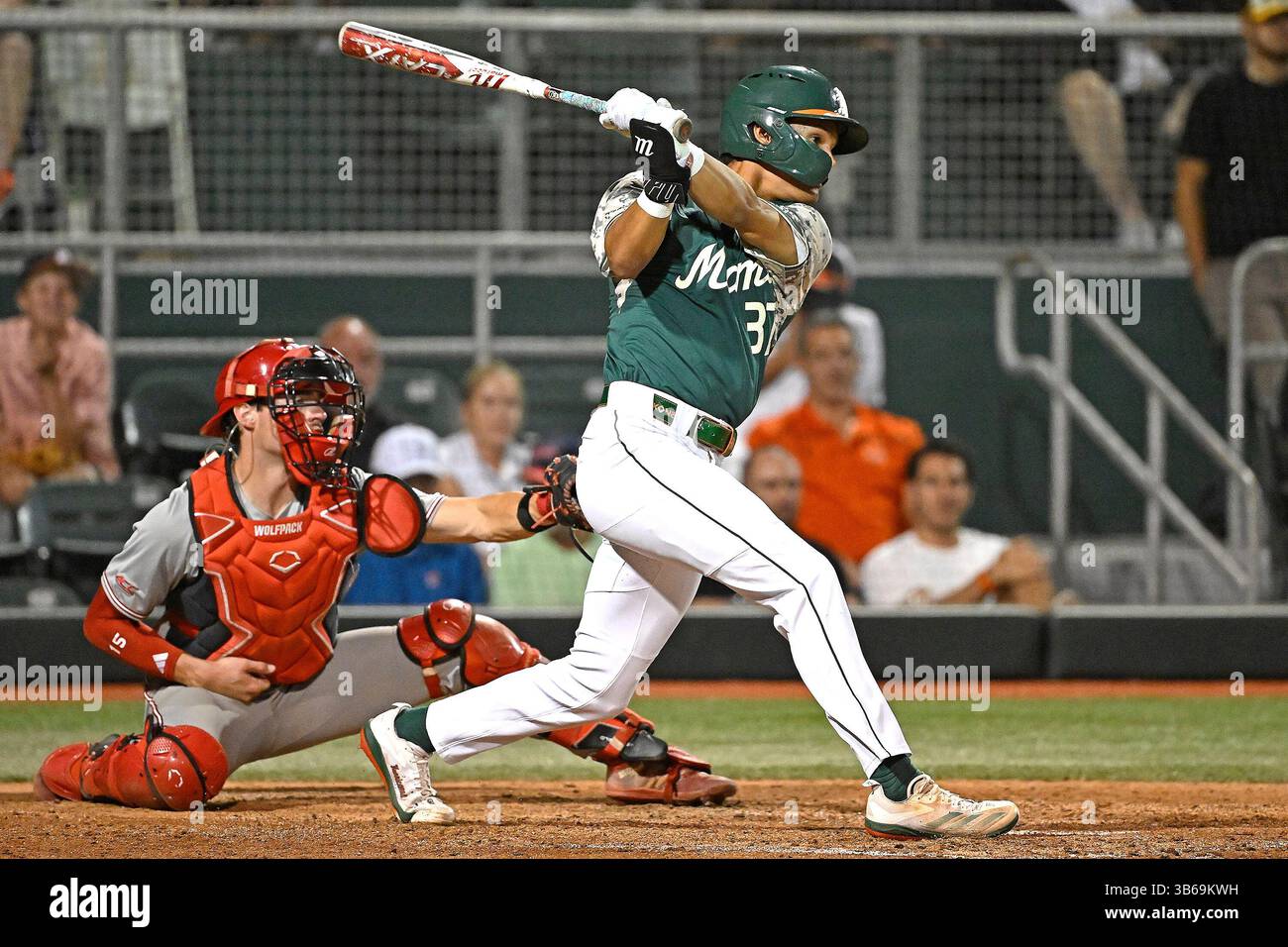 CORAL GABLES, FL - MAY 02: Miami outfielder Fabio Peralta (37) bats in ...
