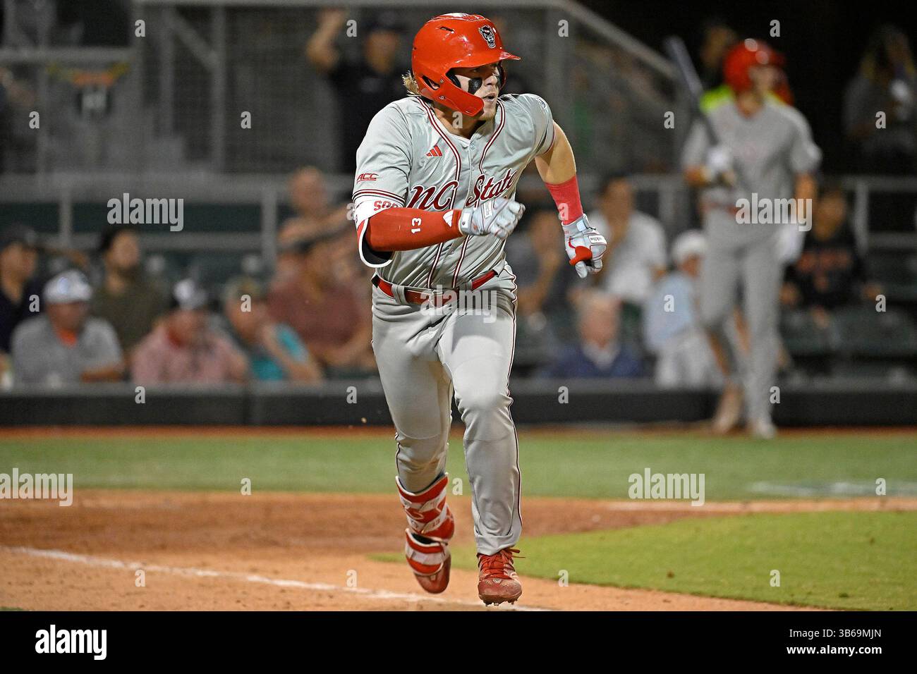 CORAL GABLES, FL - MAY 02: NC State catcher Alex Sosa (13) runs to ...