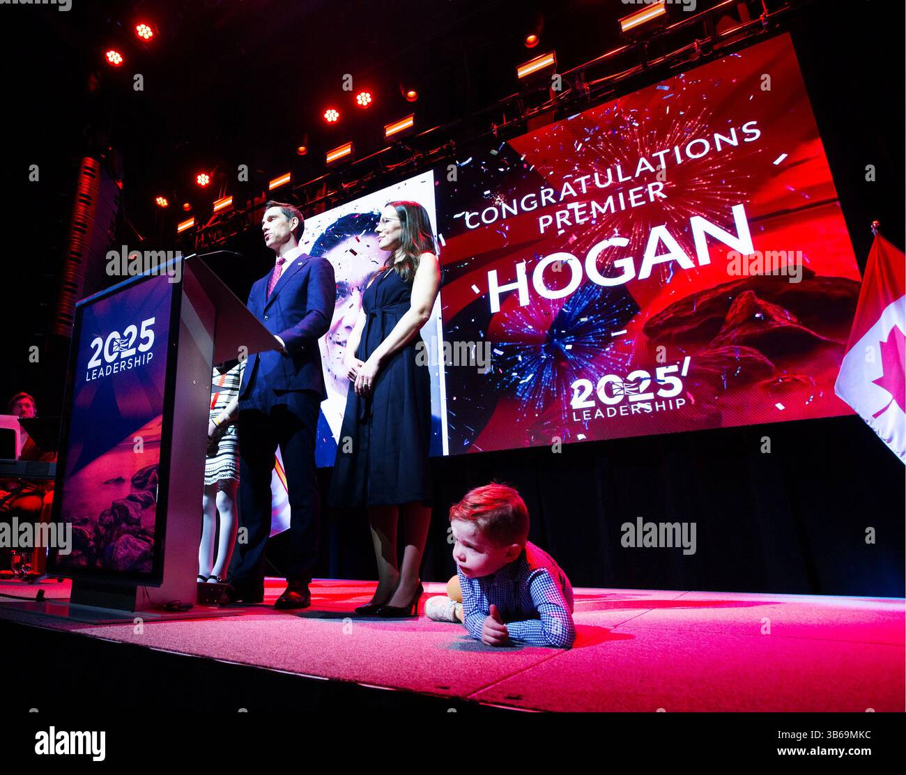 John Hogan, his wife Gillian and son Jack take the stage after he was ...