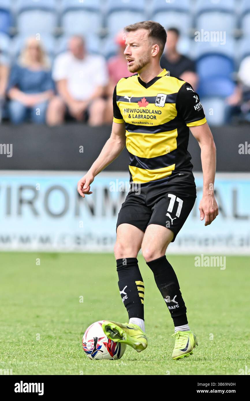Elliot Newby (11 Barrow) controls the ball during the Sky Bet League 2 ...
