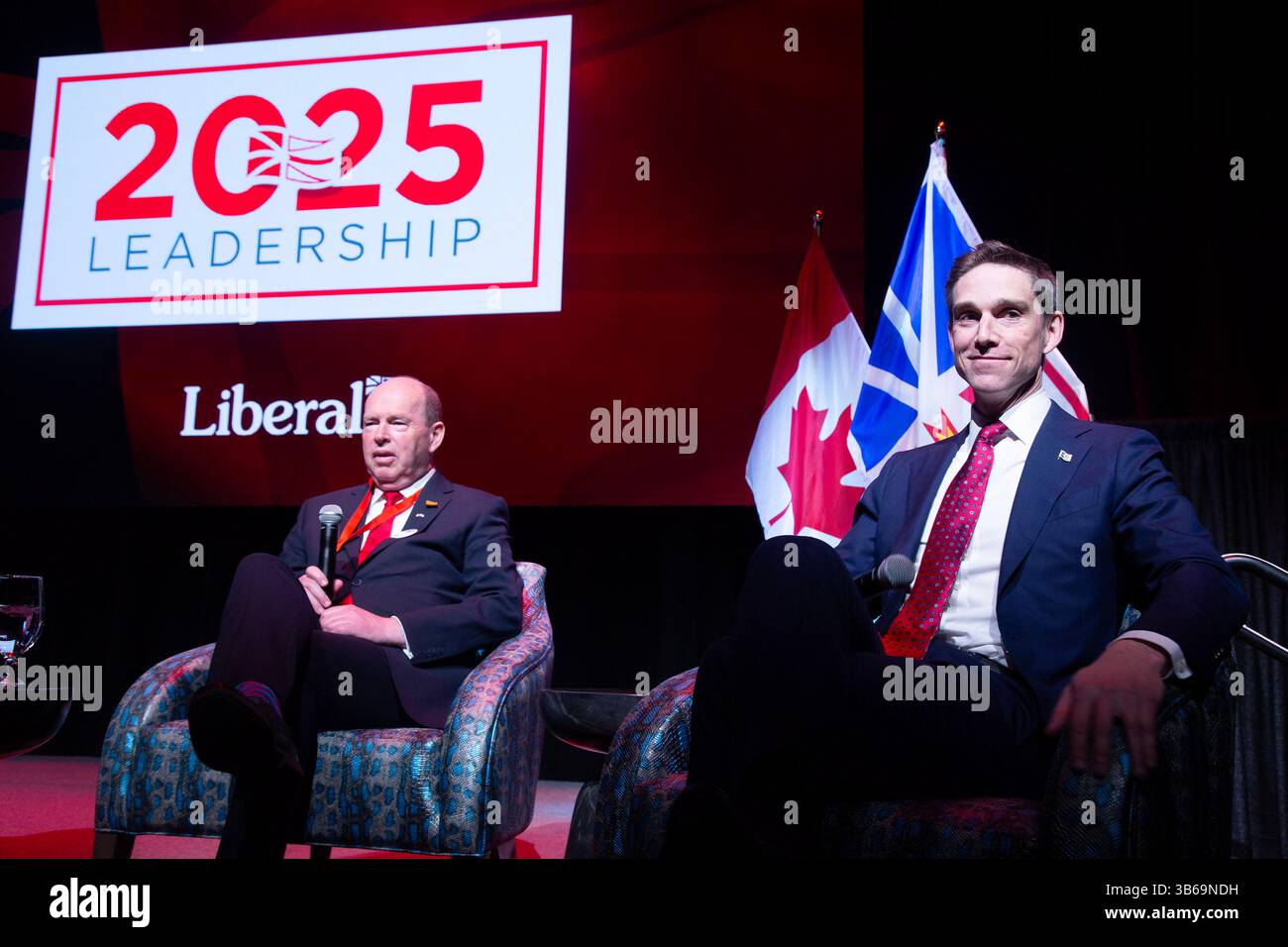 John Abbott, left, and John Hogan talk on stage prior to the ...