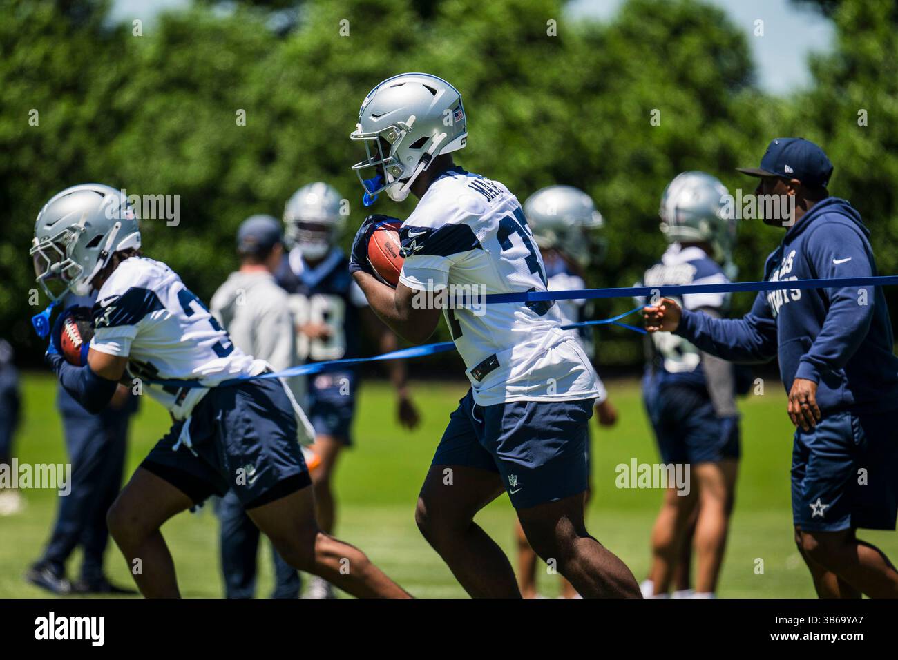 Dallas Cowboys' Phil Mafah runs a drill during the NFL football team's ...