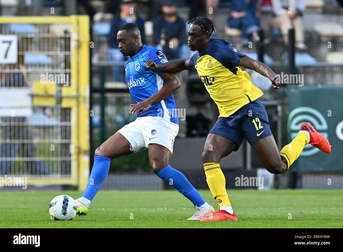 Mujaid Sadick (3) of Genk and Promise David (12) of Union fighting for ...